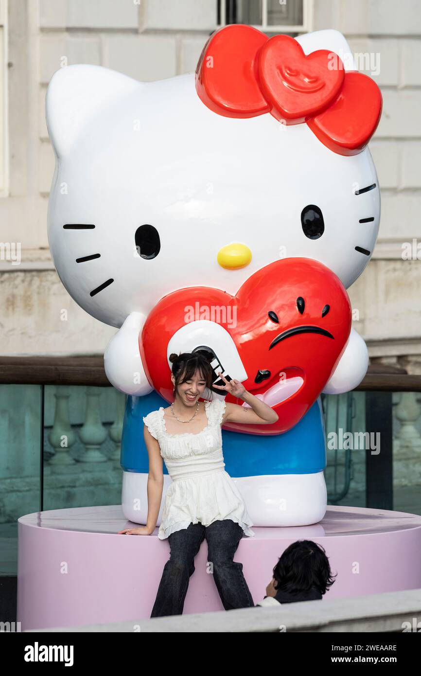 London, UK. 24 January 2024. Passers by interact with 'Hello, Love ...
