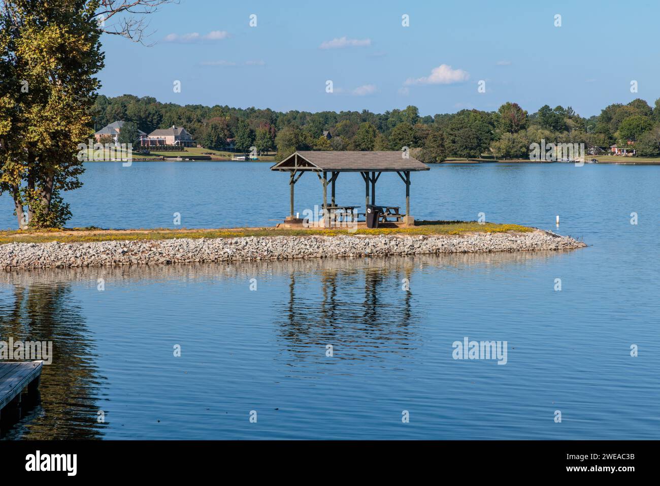 Pavilion with picnic tables on a peninsula at Beech Lake reservoir in ...
