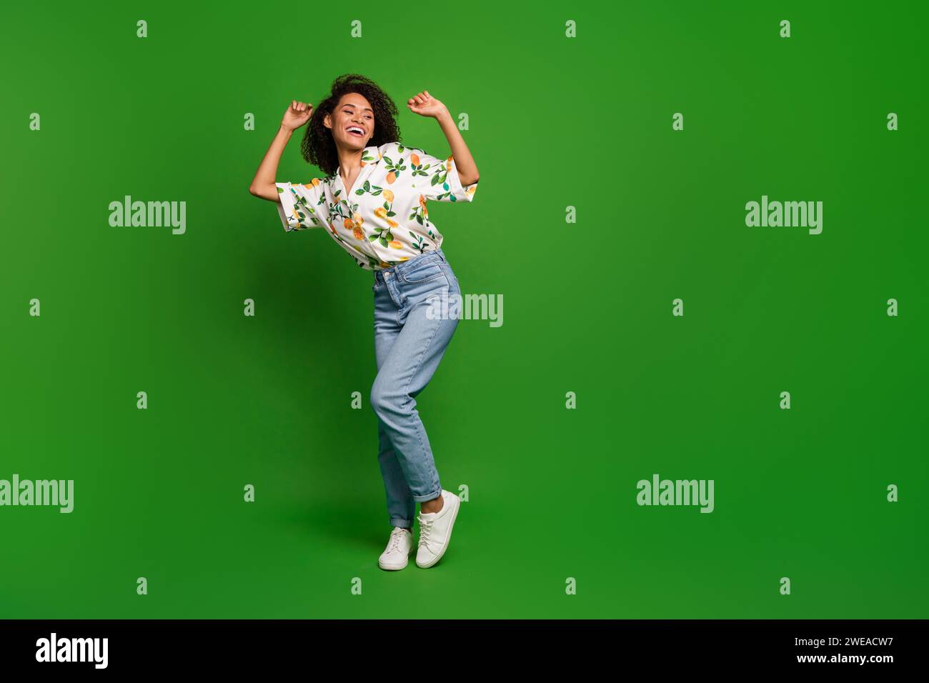 Photo of positive cheerful energetic lady raise hands up dancing ...