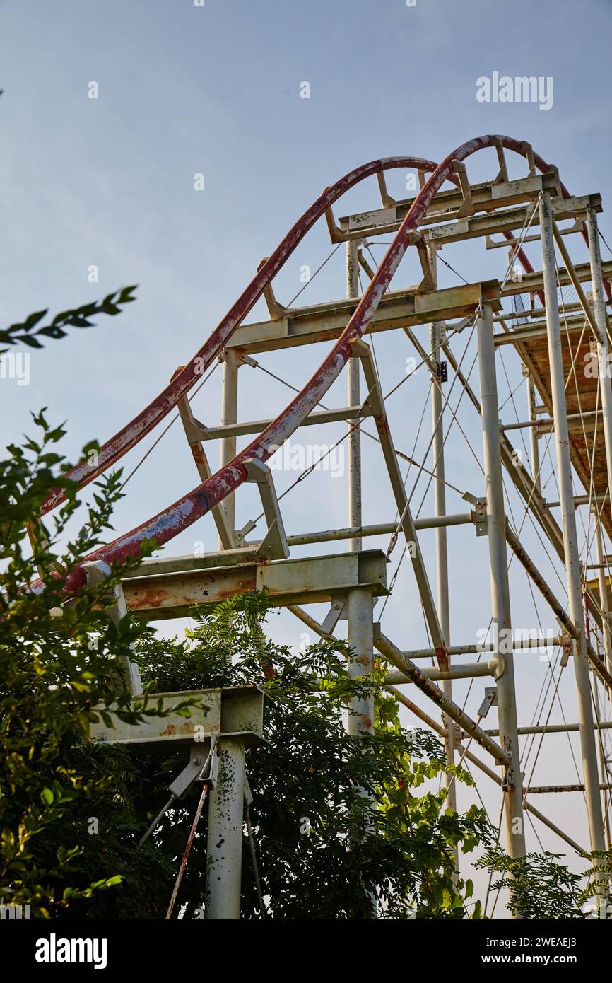 Abandoned Rusty Roller Coaster with Creeping Foliage, Ground-Up View ...