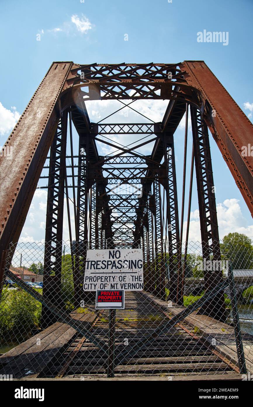 Rusted Steel Truss Bridge with No Trespassing Sign, Ground View Stock ...