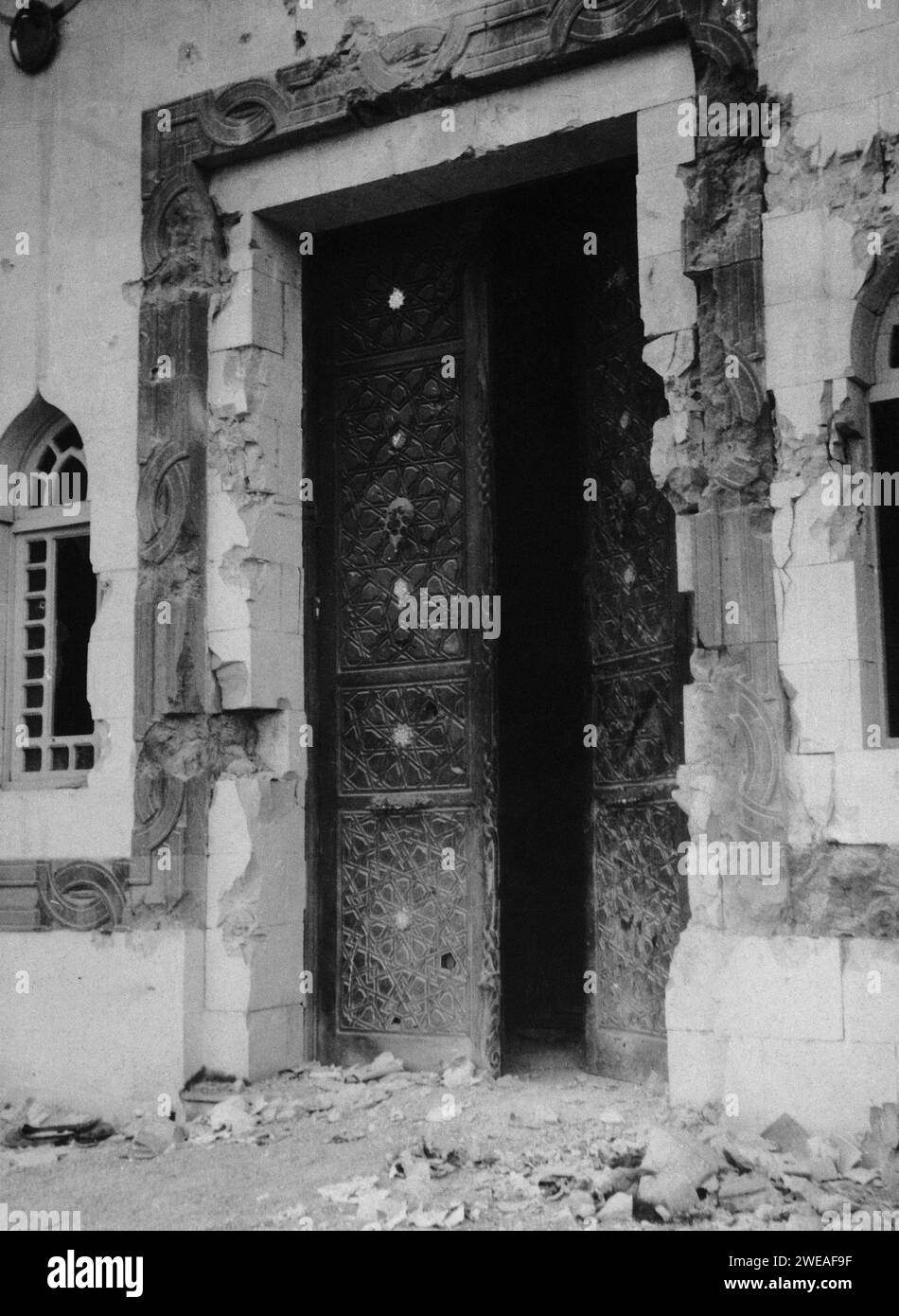 Damage to main entrance of the Syrian Parliament as photographed in ...