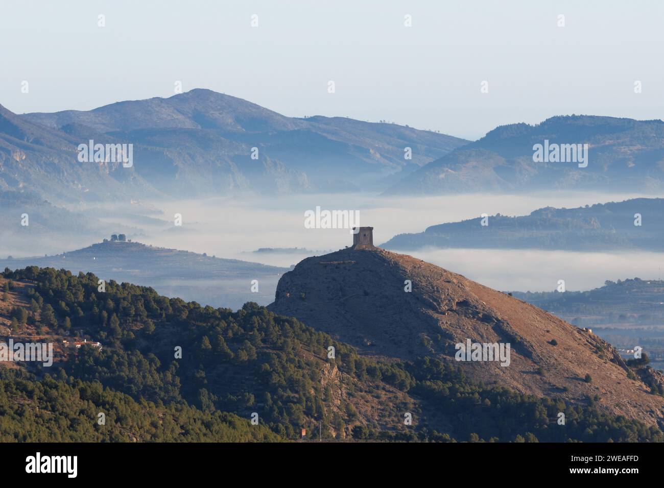 Cocentaina Valley with fog in the Serpis river basin and medieval ...