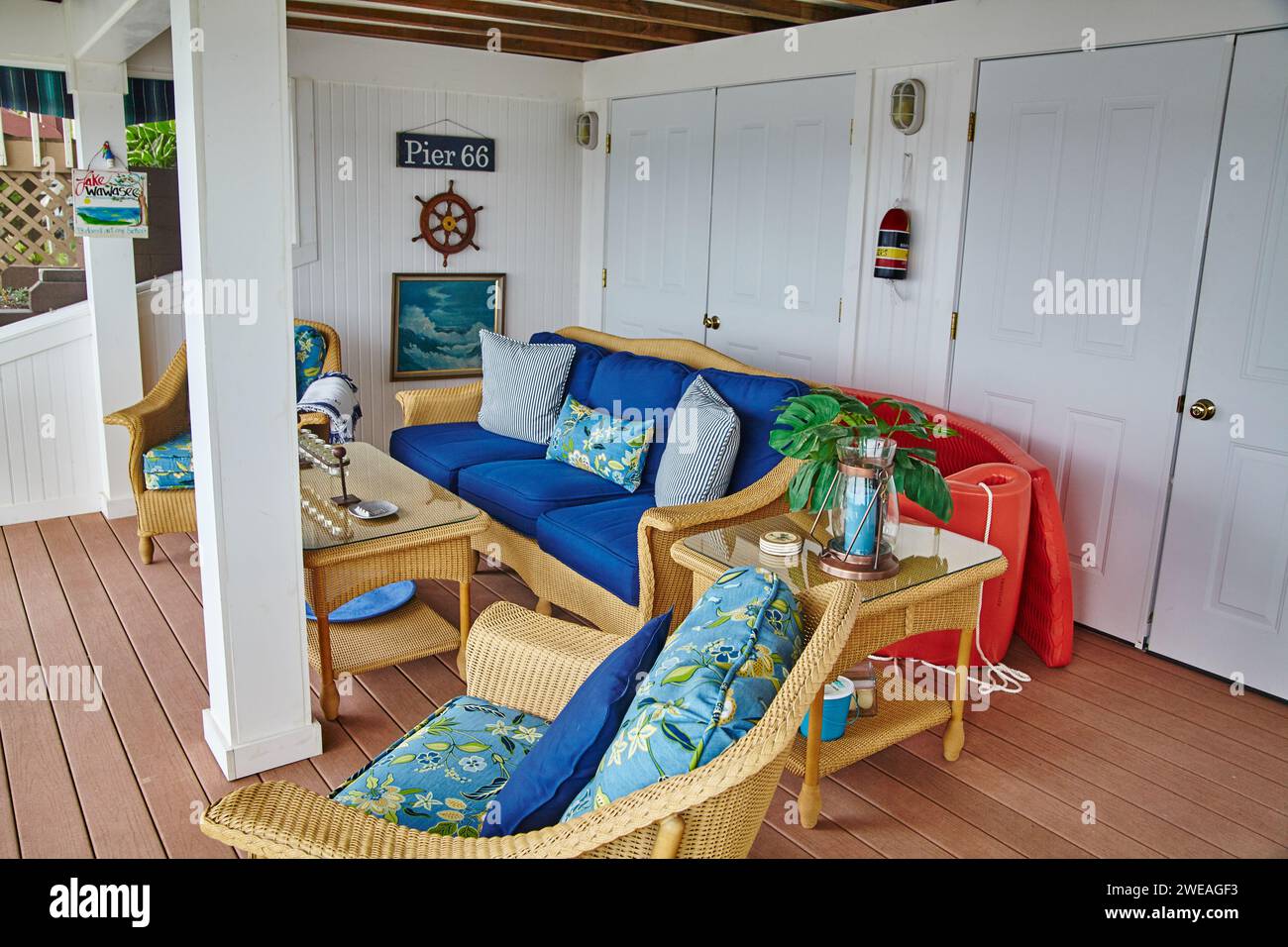 Nautical Themed Outdoor Patio with Coastal Decor and Wicker Furniture ...