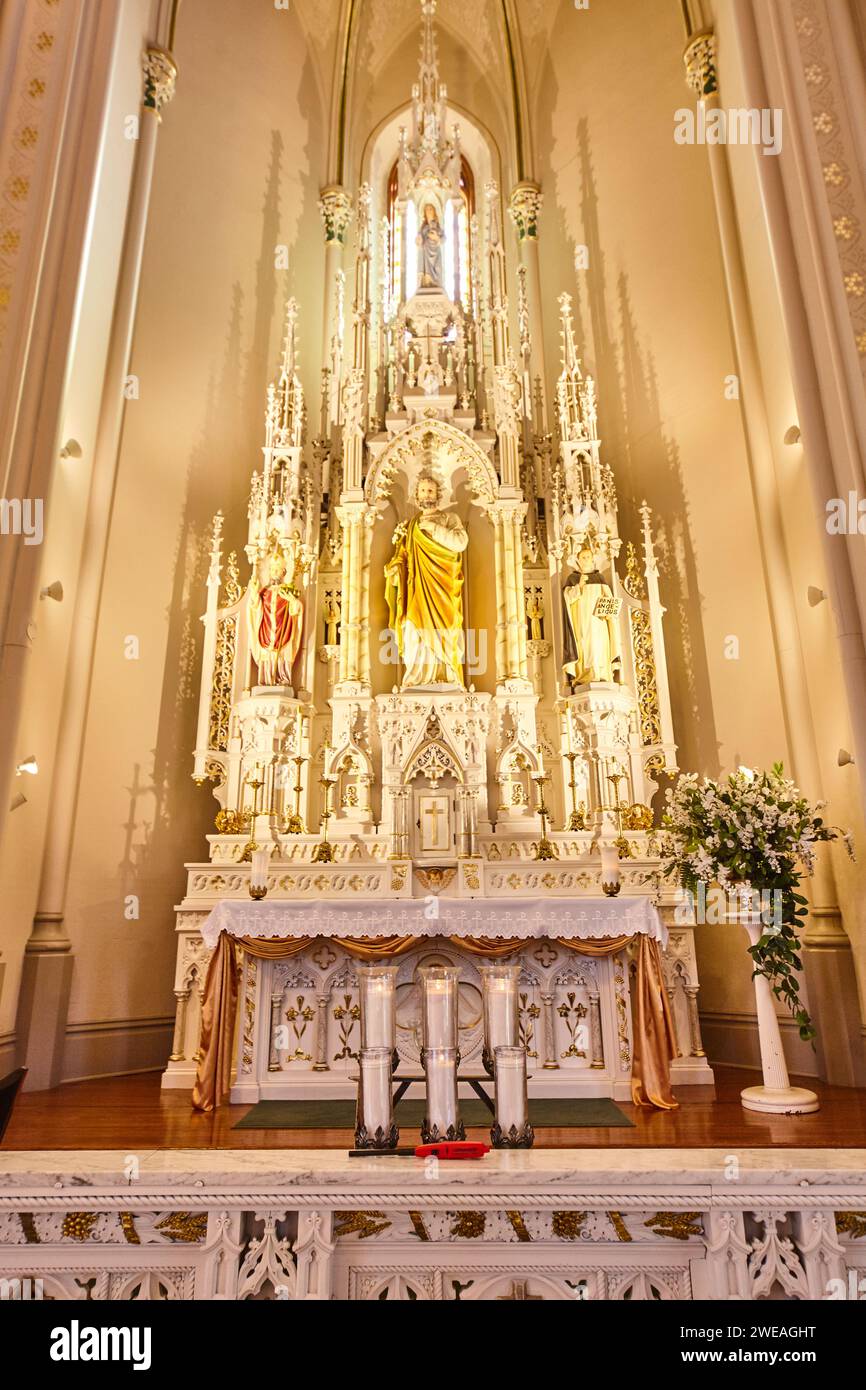 Ornate Christian Altar with Saint Statues in Warm Light Stock Photo - Alamy