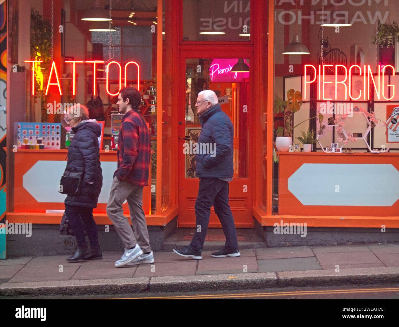 An orange shop front in Brighton Stock Photo - Alamy