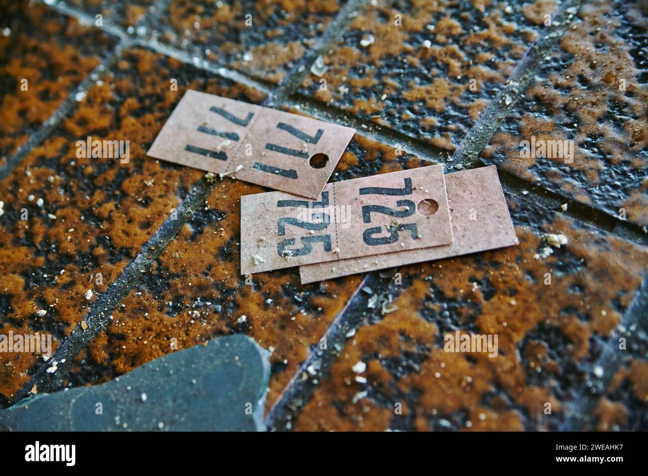 Vintage Numbered Tags on Textured Floor, Shallow Focus Stock Photo - Alamy