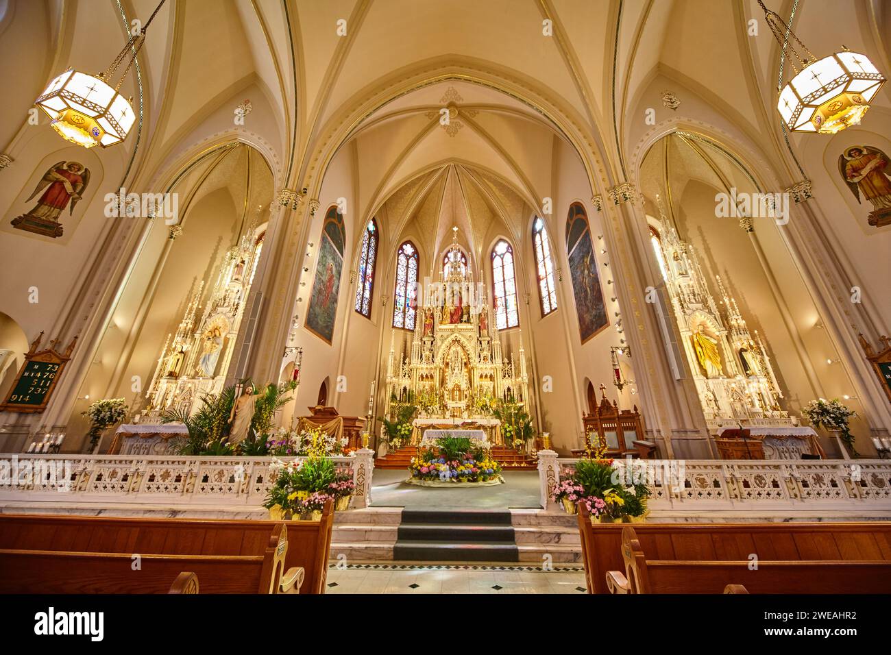 Gothic Church Interior with Stained Glass and Golden Altarpiece Stock ...