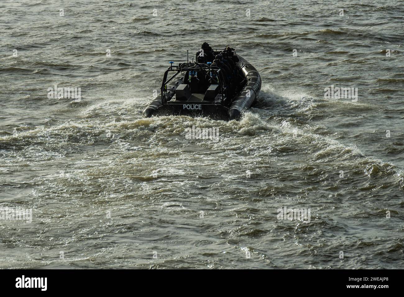 London, UK. 24th Jan, 2024. An armed Met police firearms unit on ...
