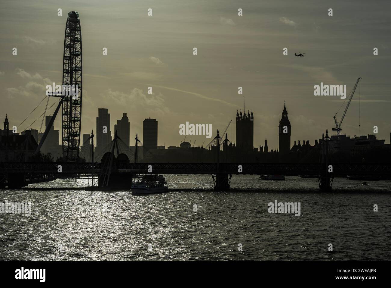 London, UK. 24th Jan, 2024. The London Eye (seen with the houses of ...