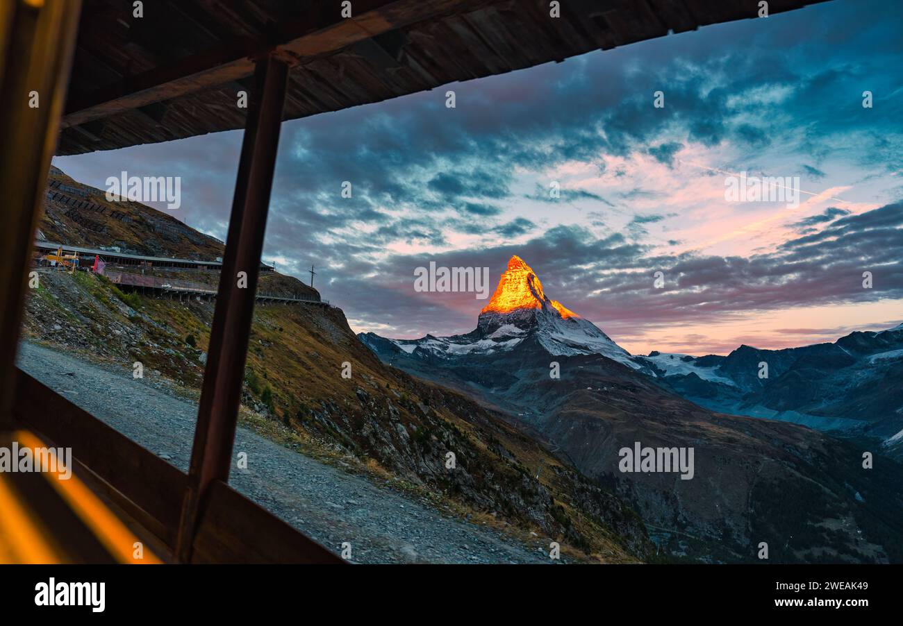 Sunrise alpenglow on Matterhorn iconic mountain of Swiss Alps in the ...