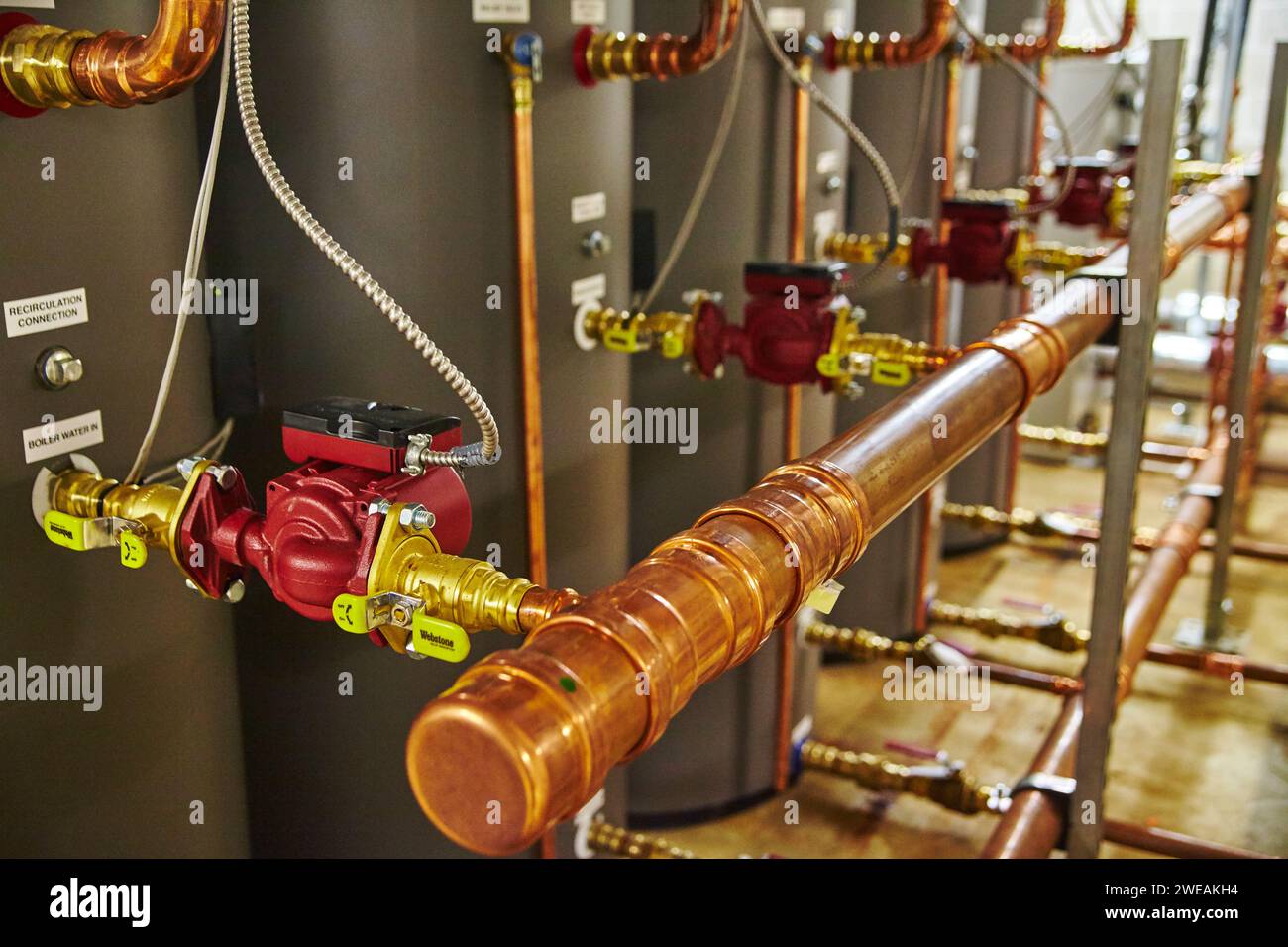Copper Pipes and Valves in Industrial Heating System Stock Photo - Alamy