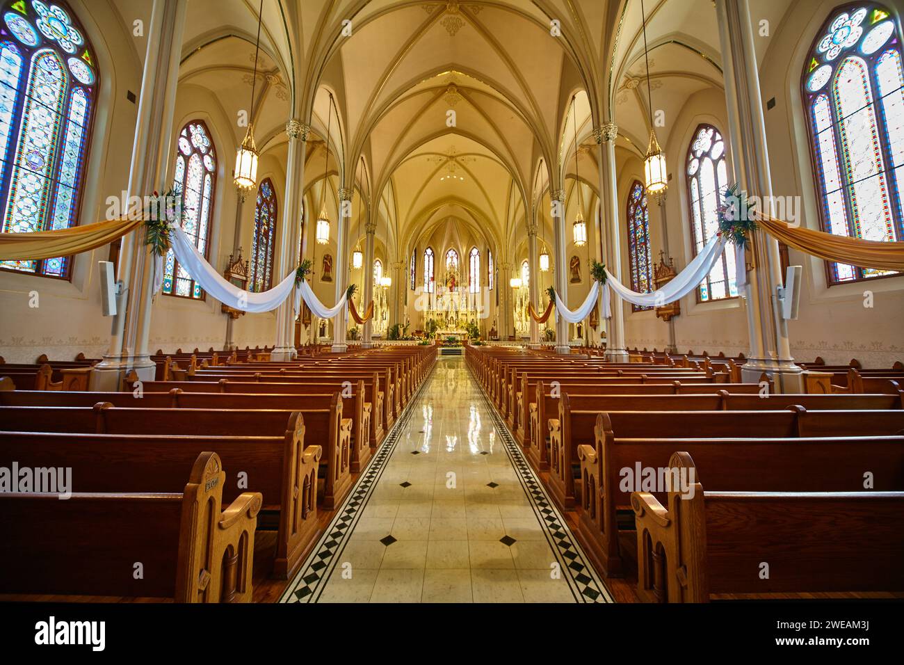 Gothic Church Interior with Stained Glass and Wedding Decorations Stock ...