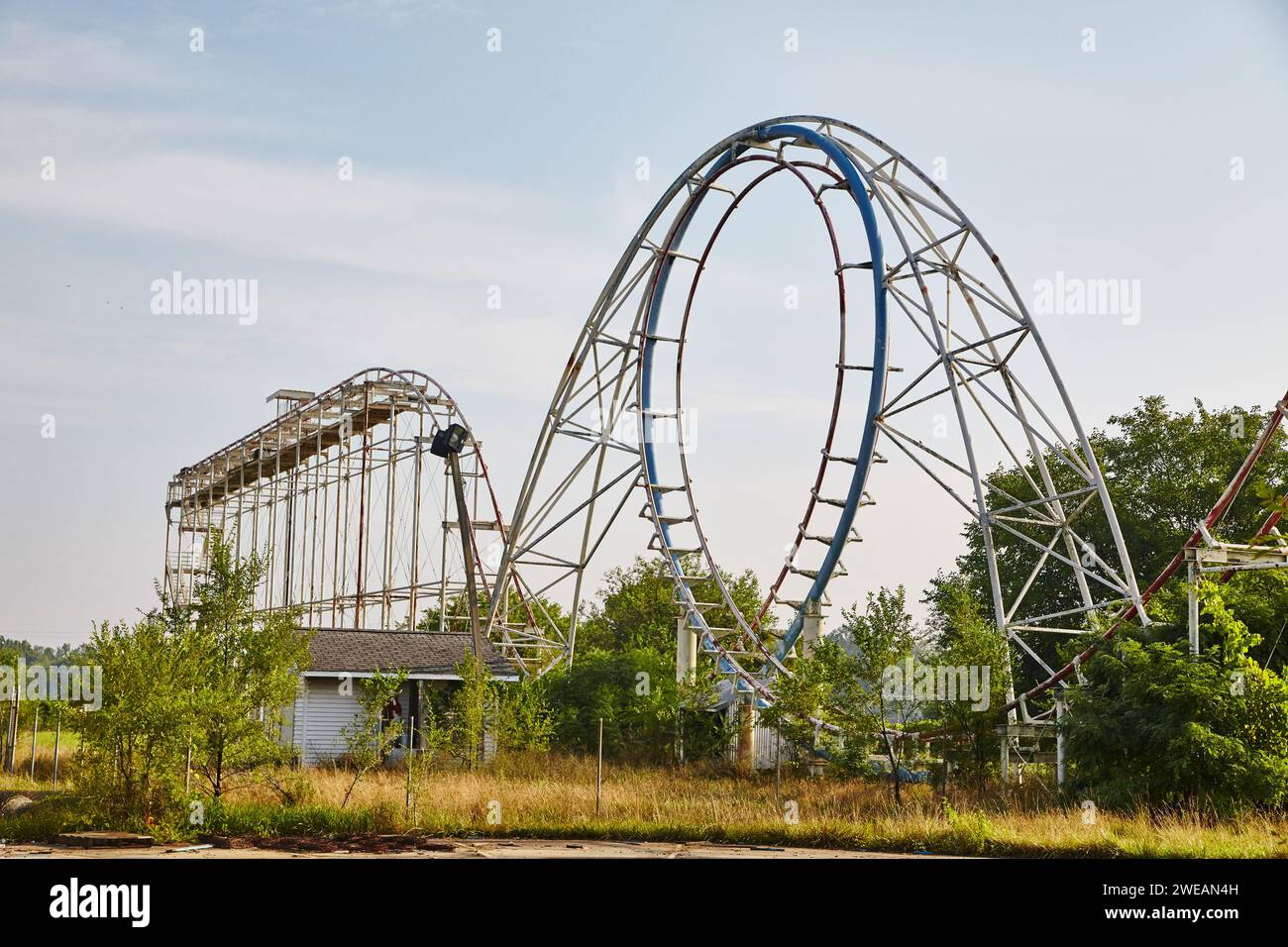Deserted Amusement Park Roller Coaster in Decay, Overgrown and ...