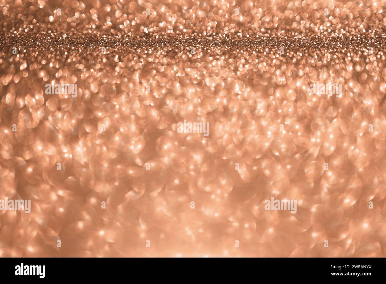 Peach fuzz sparkling glitter bokeh background, abstract defocused ...