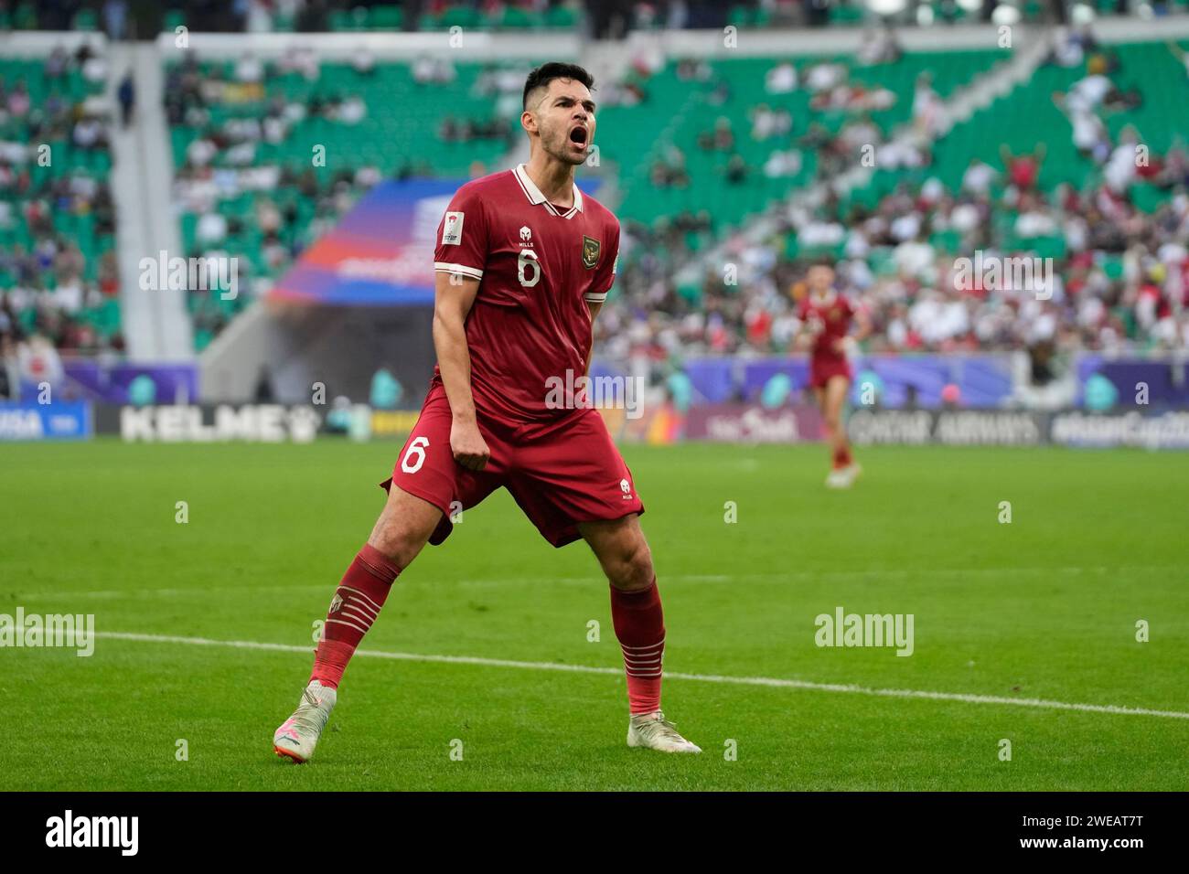 Indonesia's Sandy Walsh celebrates after scores his first goal during ...