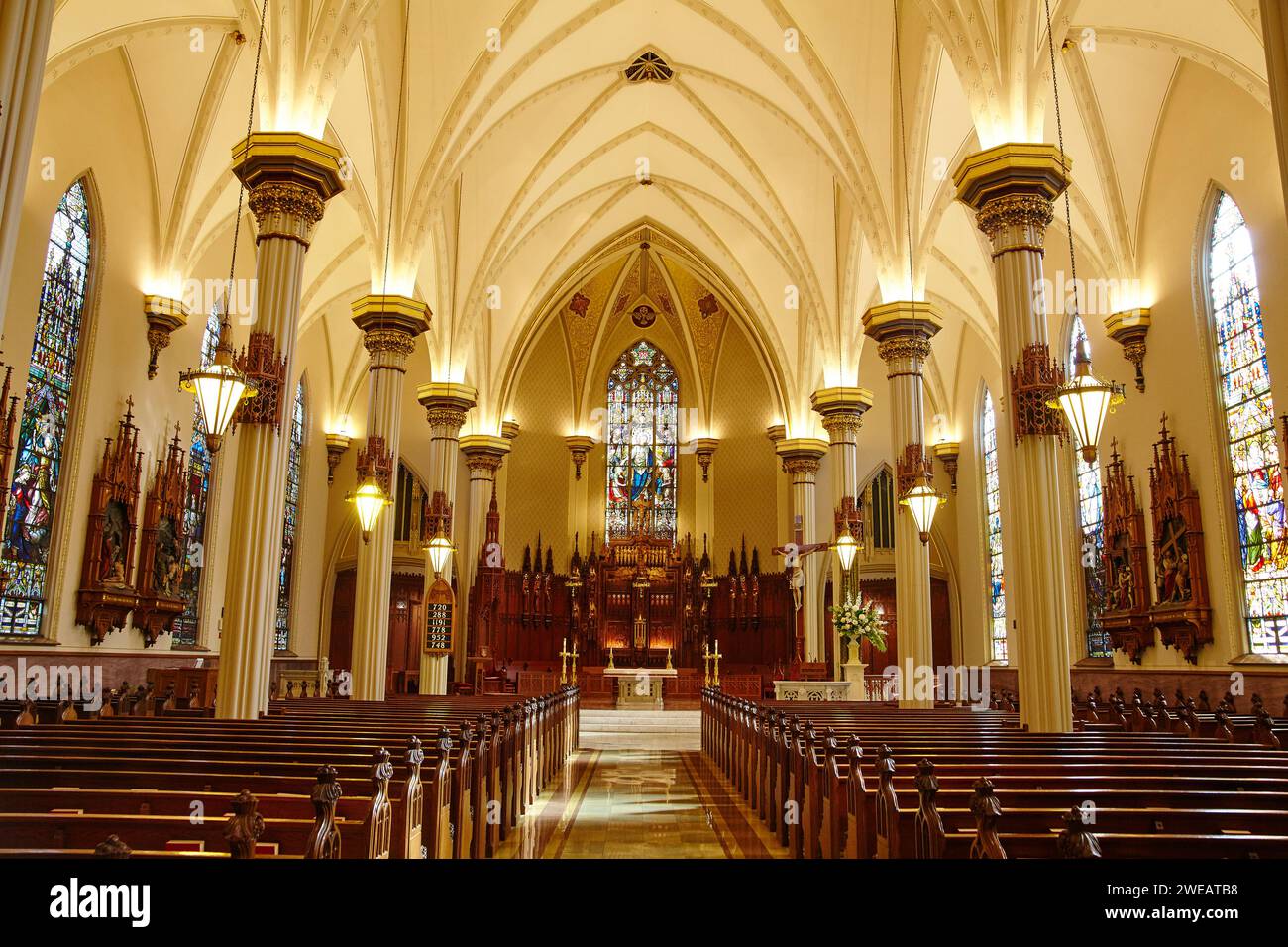 Gothic Cathedral Interior with Stained Glass and Altar, Nave View Stock ...