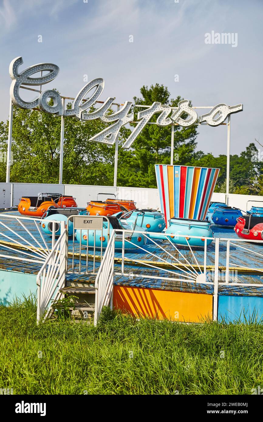 Colorful Vintage Calypso Amusement Park Ride under Blue Sky Stock Photo ...