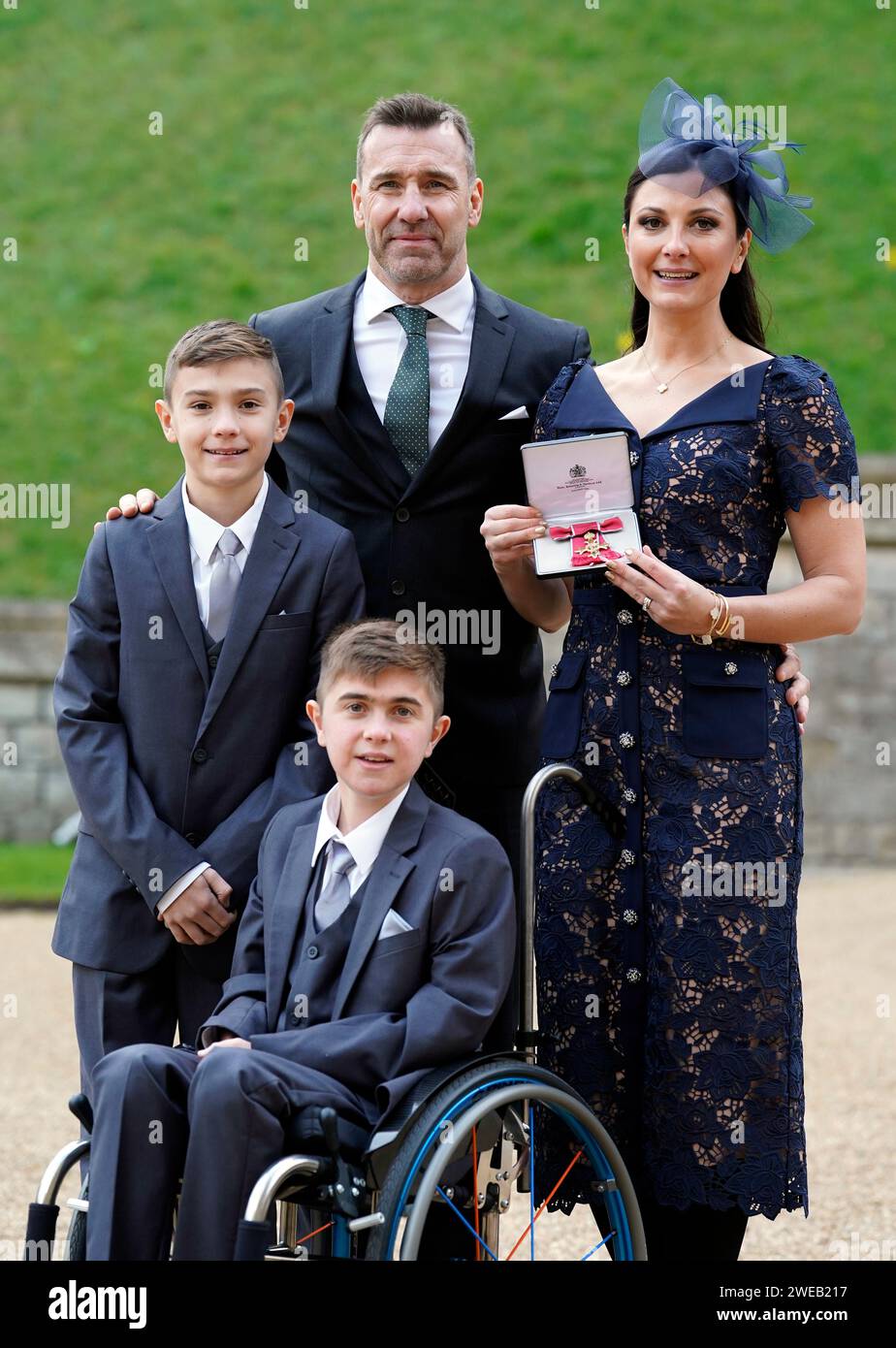 Alexandra Johnson (right) poses for a photograph with her husband Andy ...