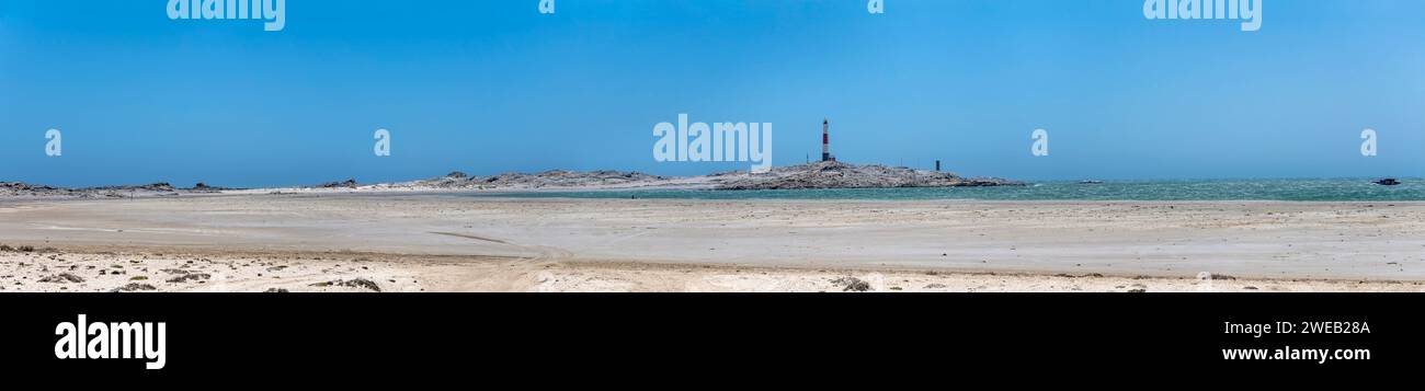 landscape with Atlantic ocean shore and lighthouse, shot in bright late ...