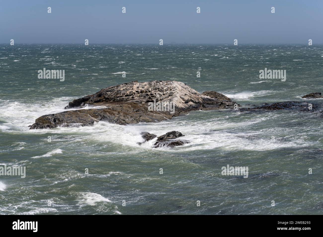 landscape with basalt cliff battered by Atlantic ocean waves, shot in ...