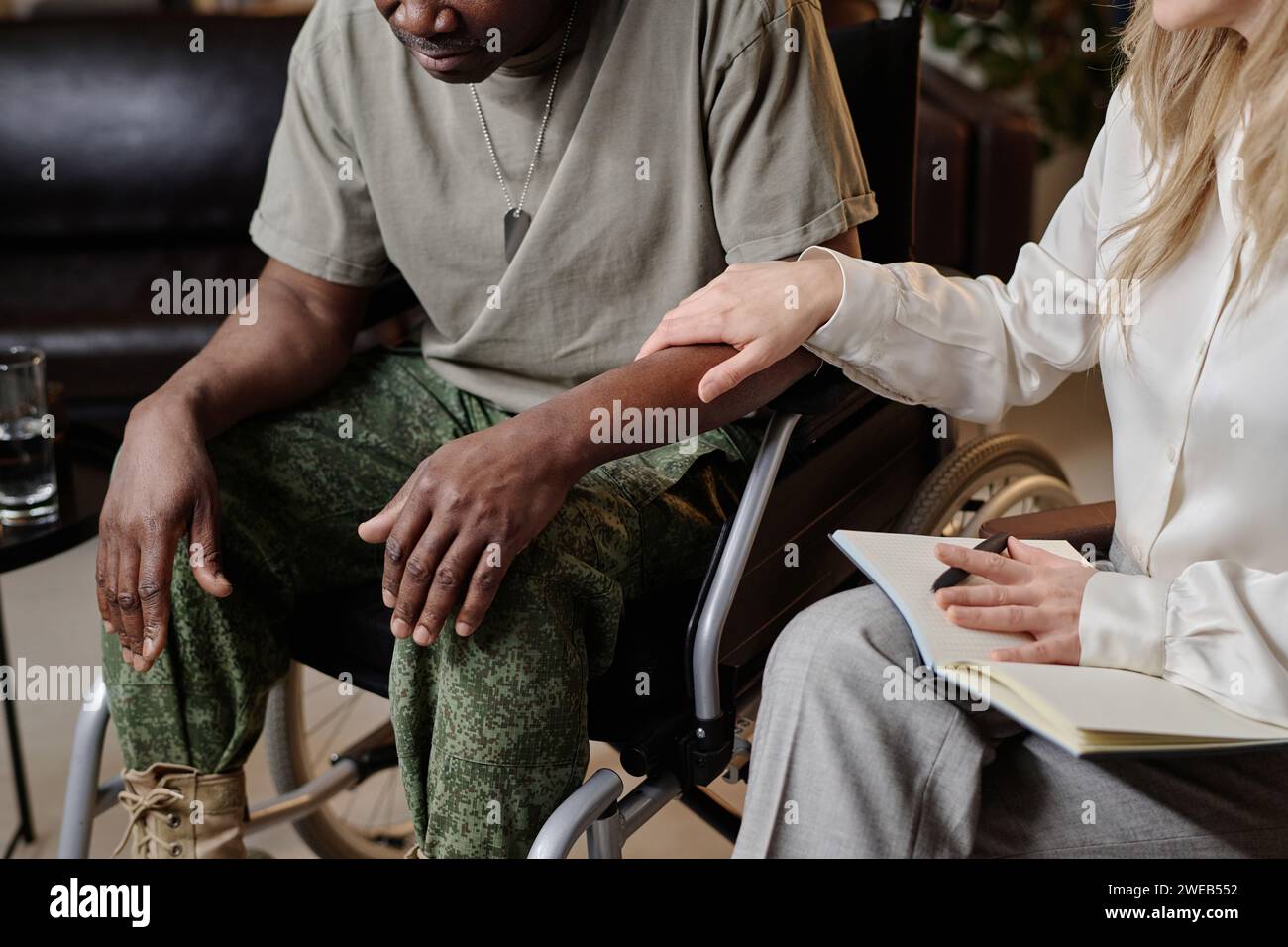 Caucasian female psychotherapist comforting grieving african american ...