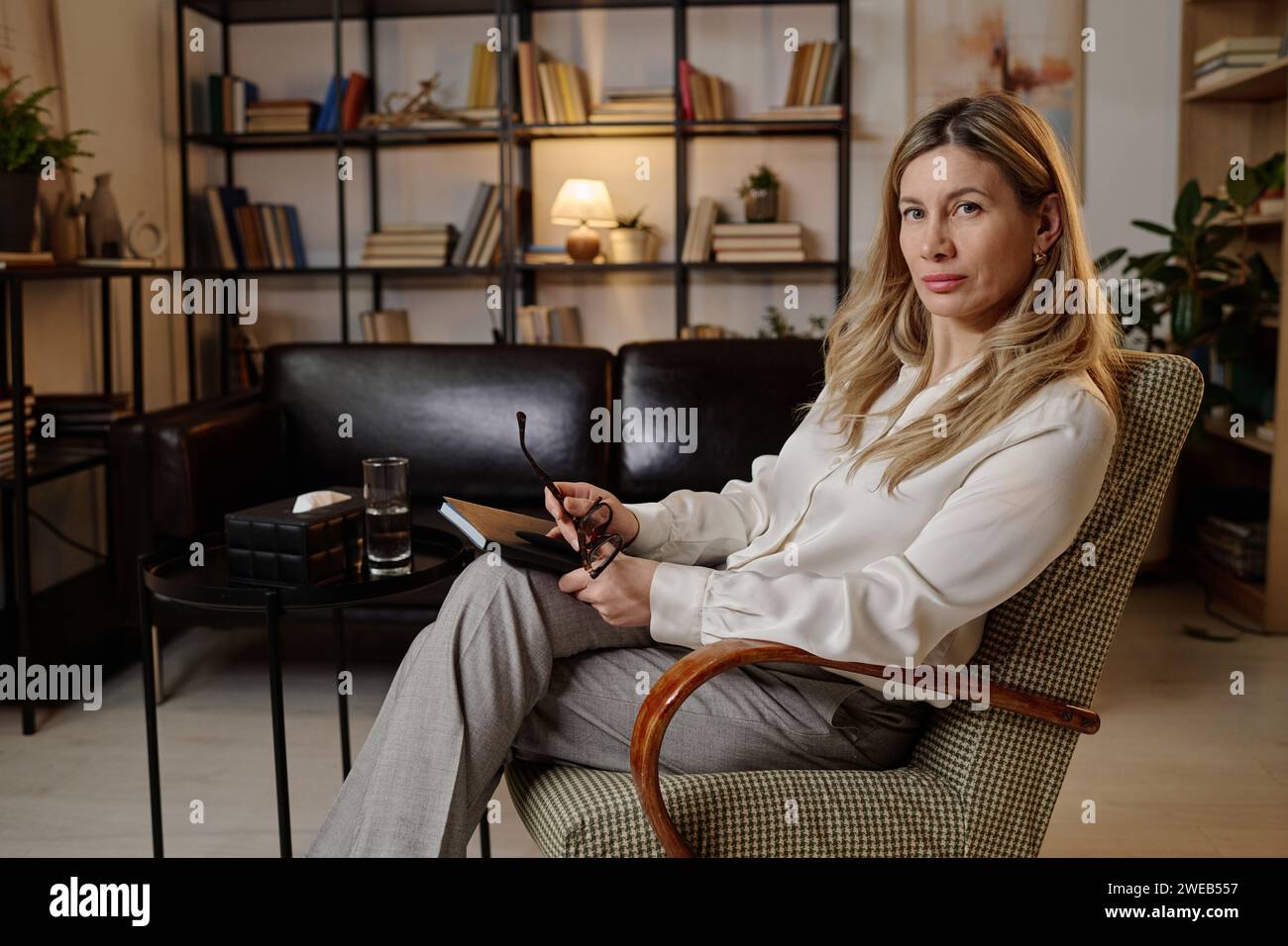 Caucasian female mental health specialist posing at her workplace in ...