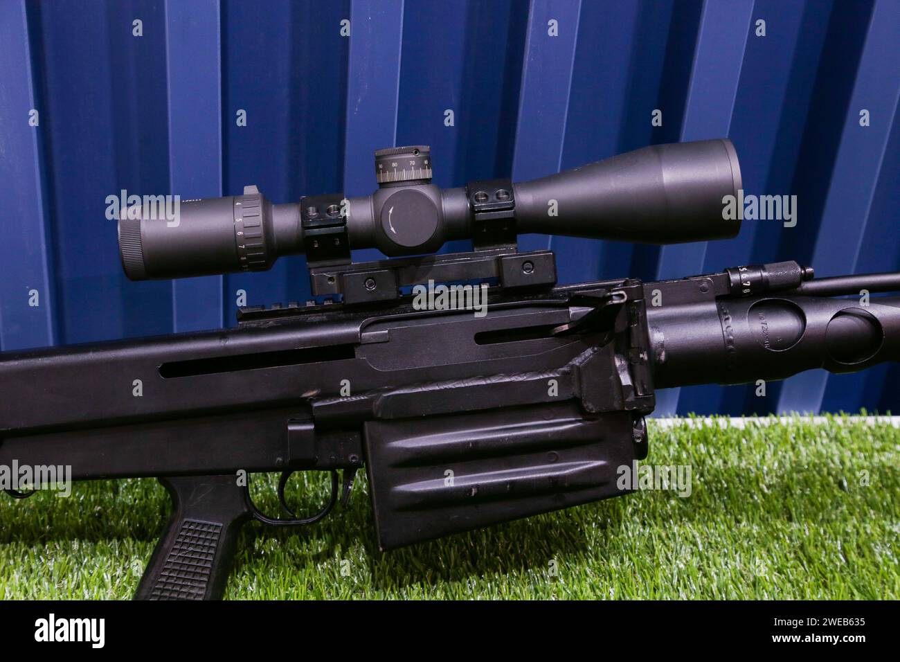 A fragment of an optical sight on a sniper rifle. Weapon shown for ...
