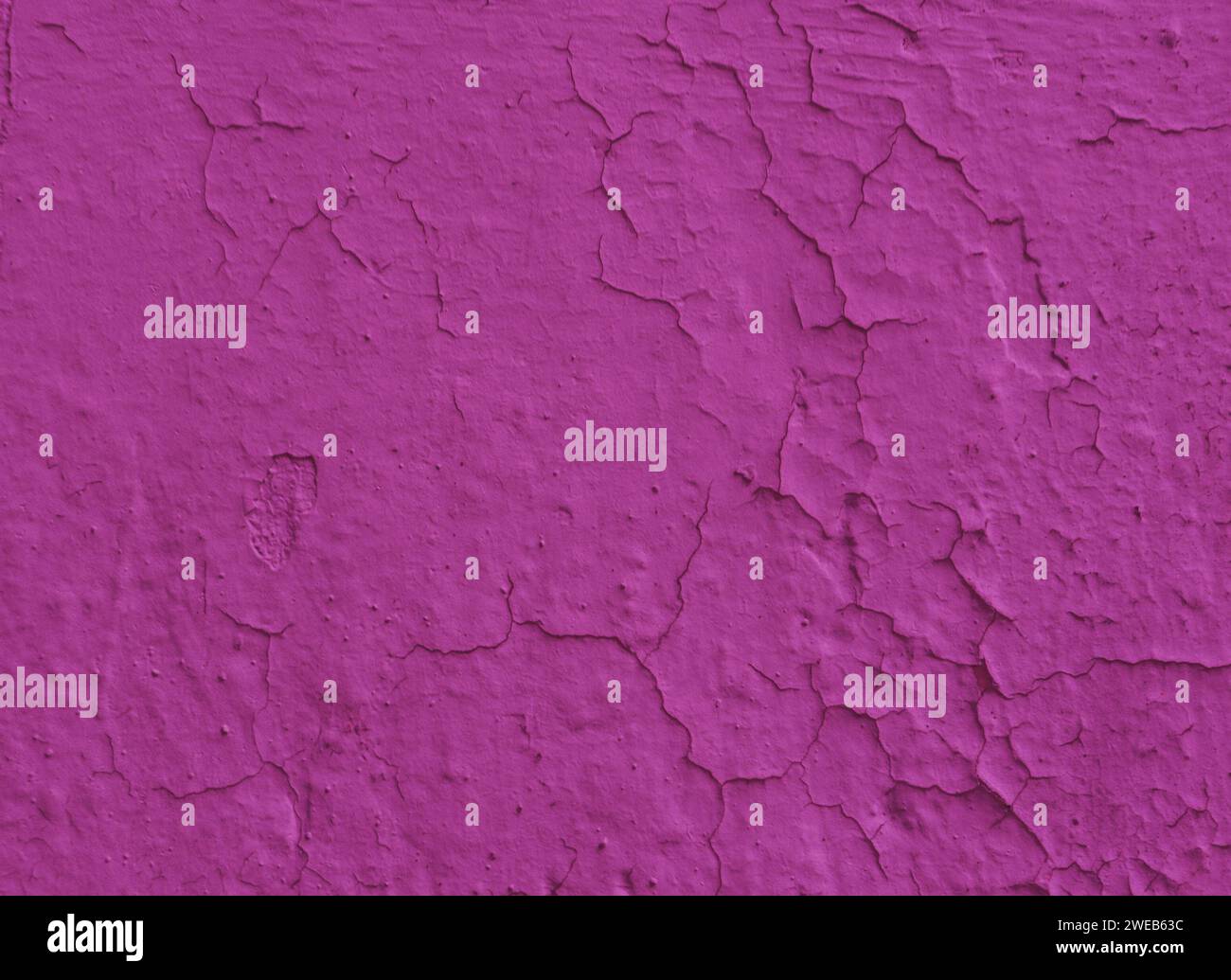 Scuffed peeling purple plaster on the wall Stock Photo - Alamy