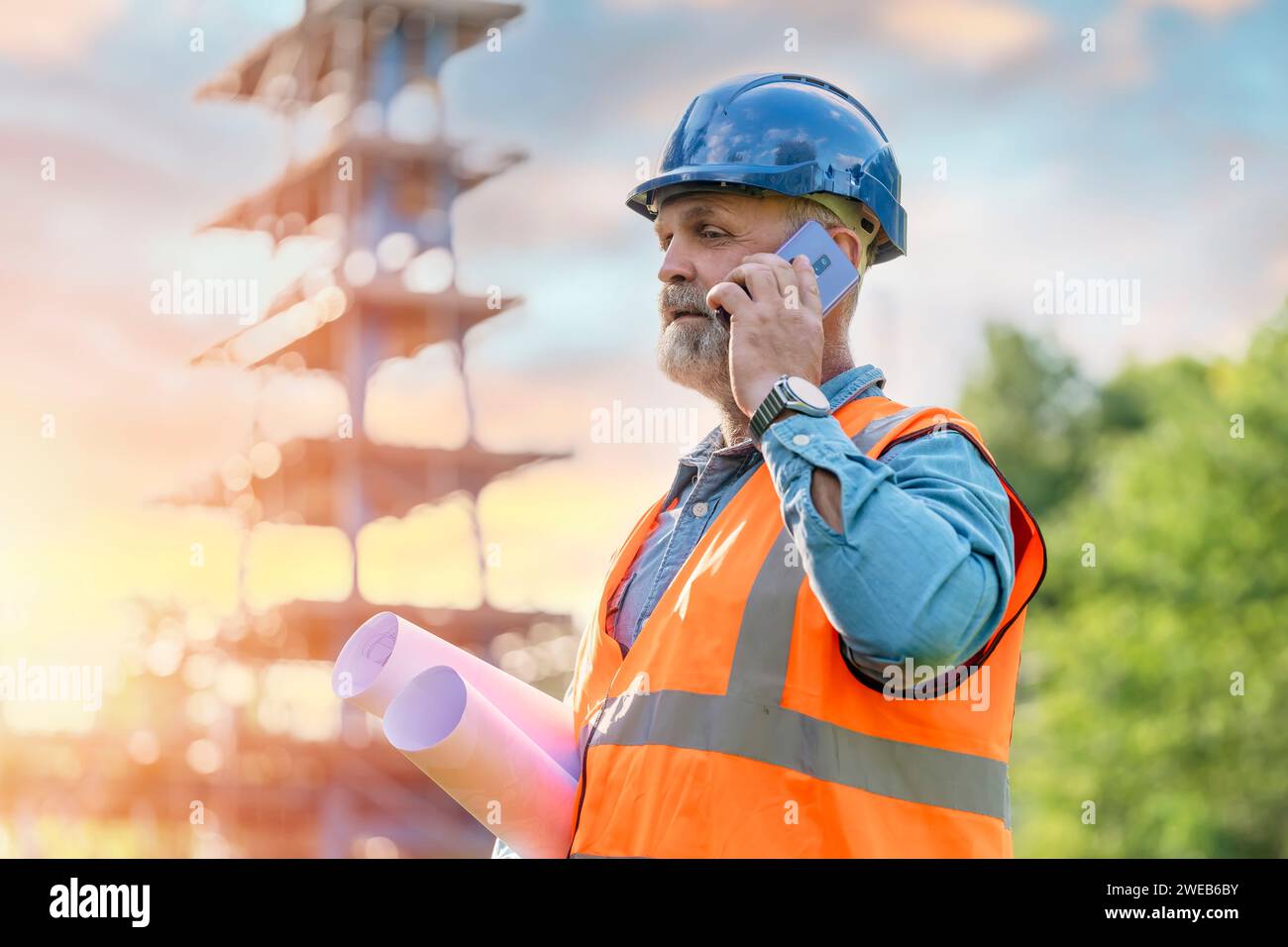 A man site engineer surveyor working with theodolite total station EDM ...