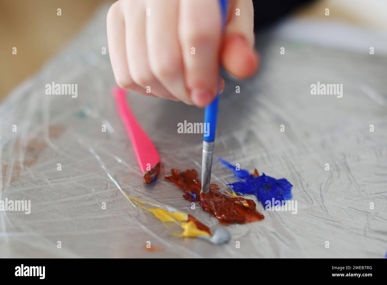 female hand mixing acrylic paints Stock Photo - Alamy