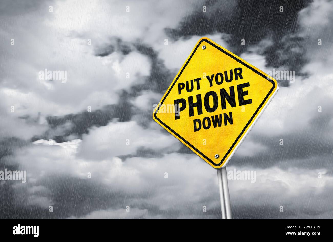 Put your phone down - traffic sign message Stock Photo - Alamy