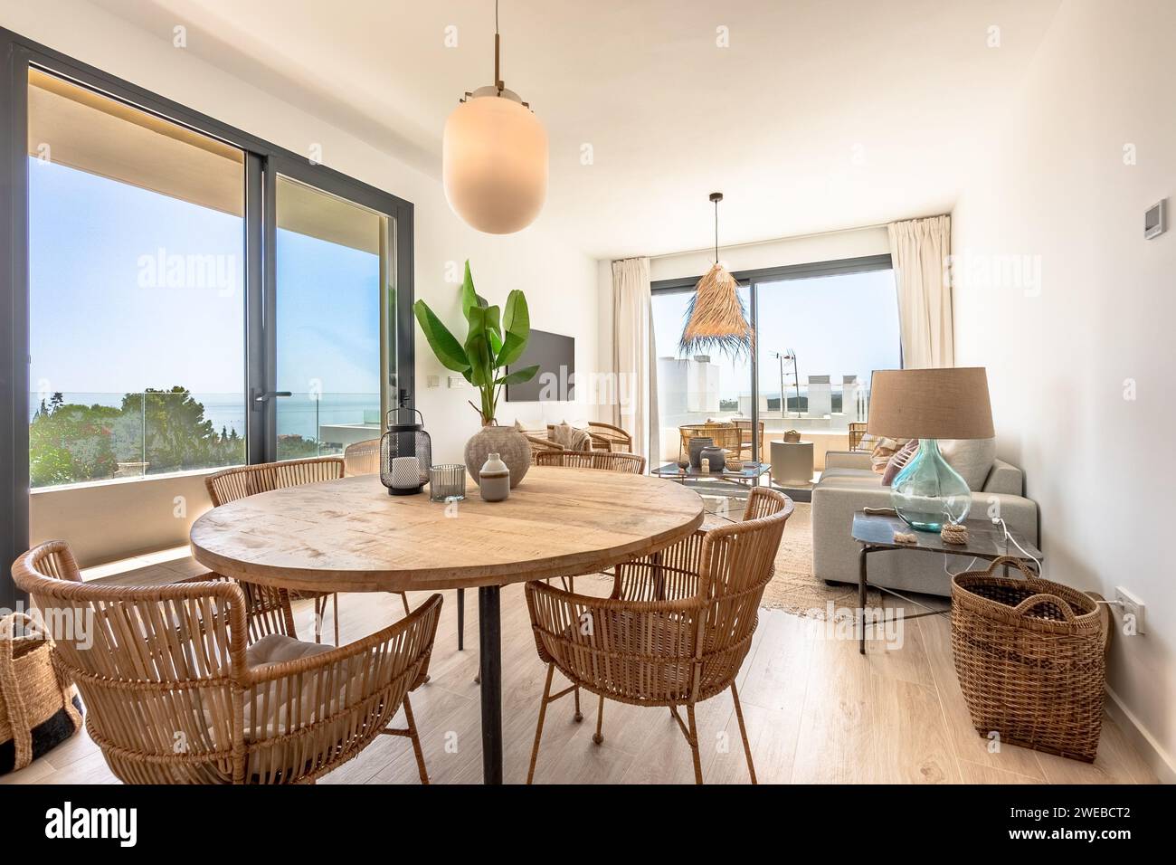 a luxury mediterranean living room with double balcony terrace and ...