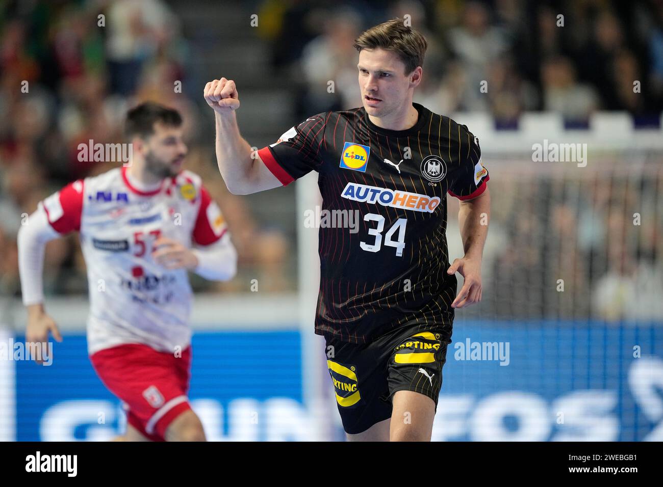 Germany's Rune Dahmke celebrates after scoring during the Handball ...