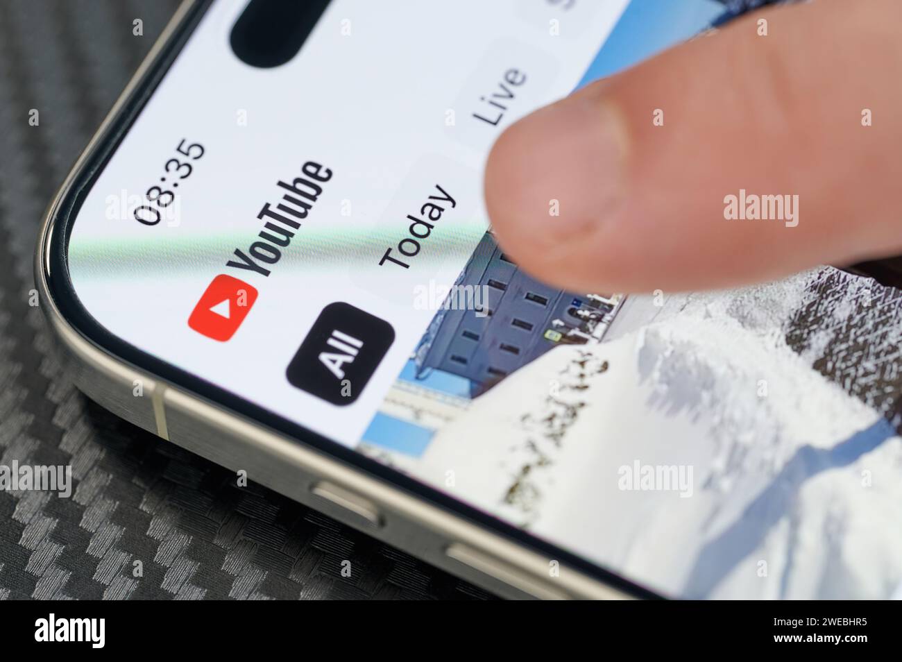 New York, USA - January 24, 2024: Watching youtube video on iphone 15 ...