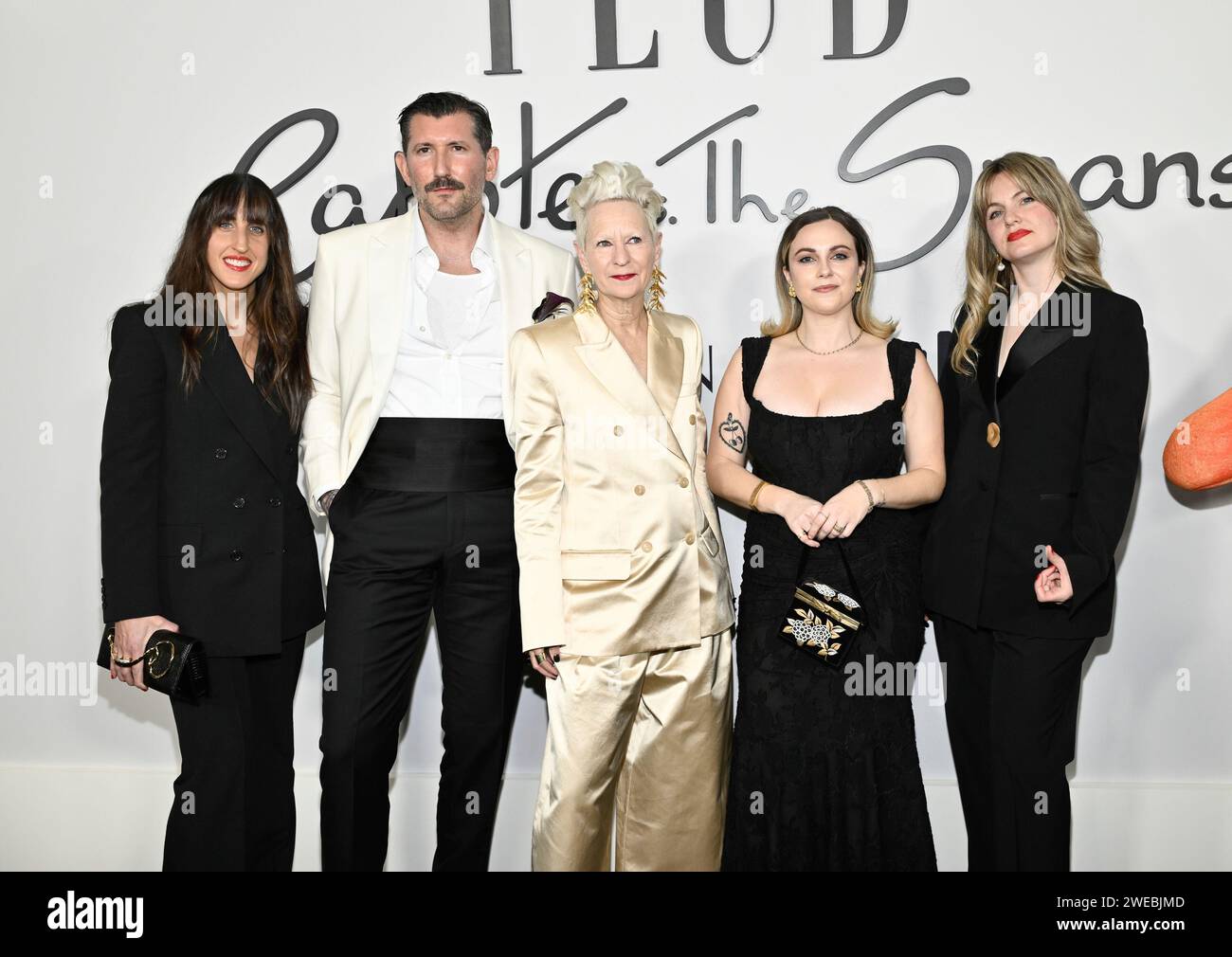 Lou Eyrich, center, and guests attend the premiere of FX's "Feud: Capote Vs. The Swans" at the ...