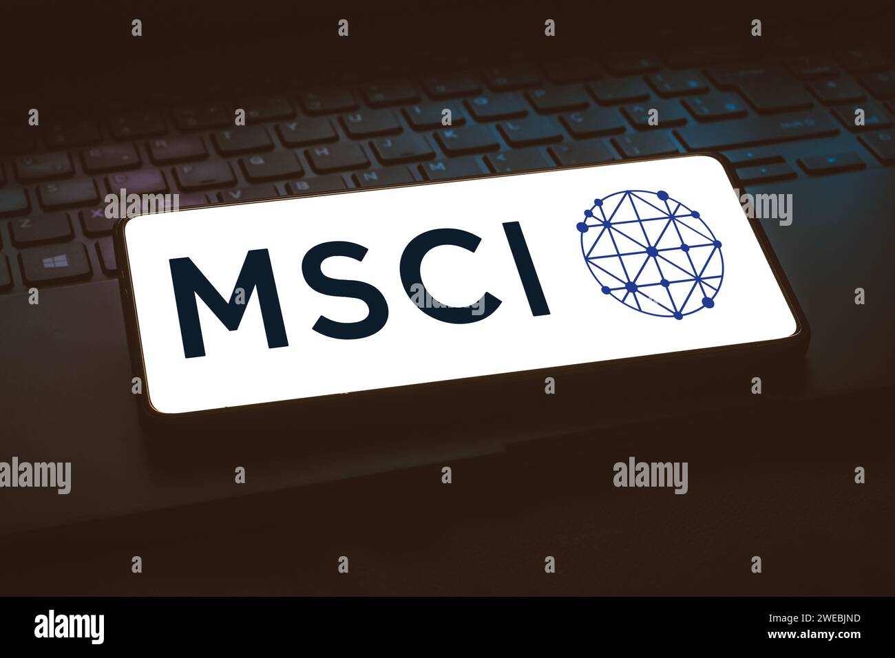 In this photo illustration, the MSCI Inc. logo is displayed on a smartphone screen Stock Photo ...