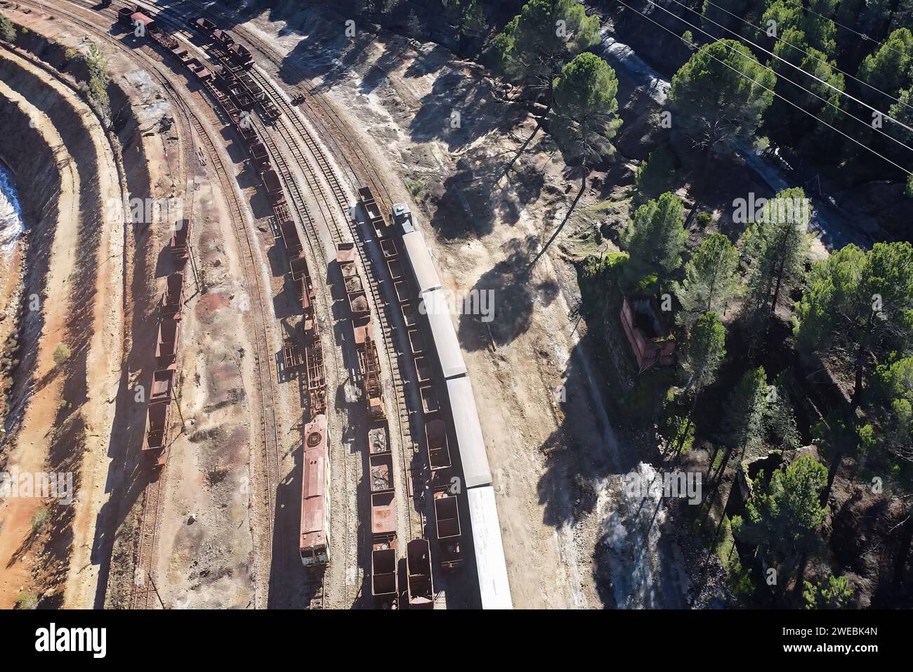 Aerial drone view of the old tourist train on a tour of the remains of ...