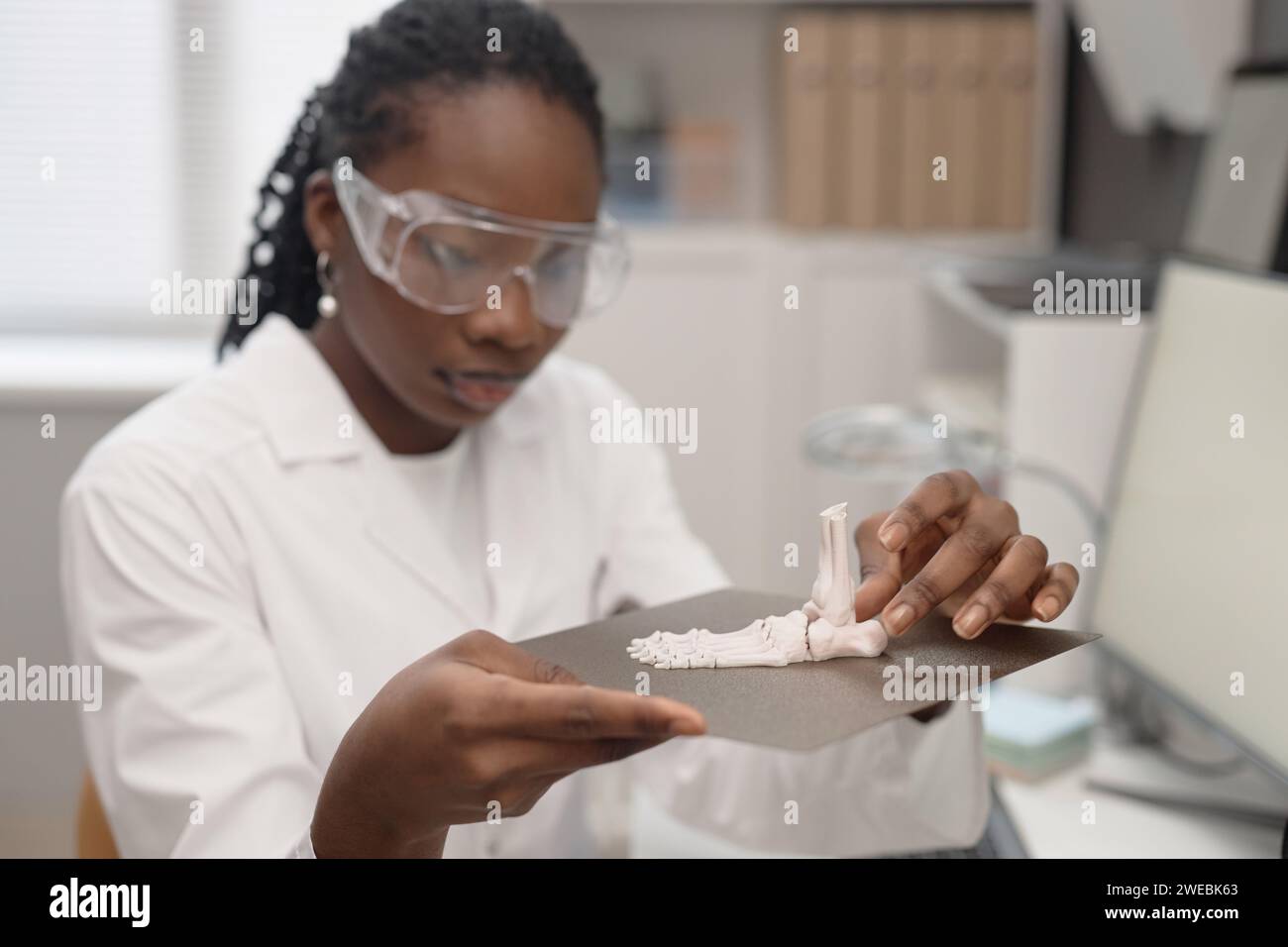 Female Scientist Inspecting 3D Printed Sample in Lab Stock Photo - Alamy