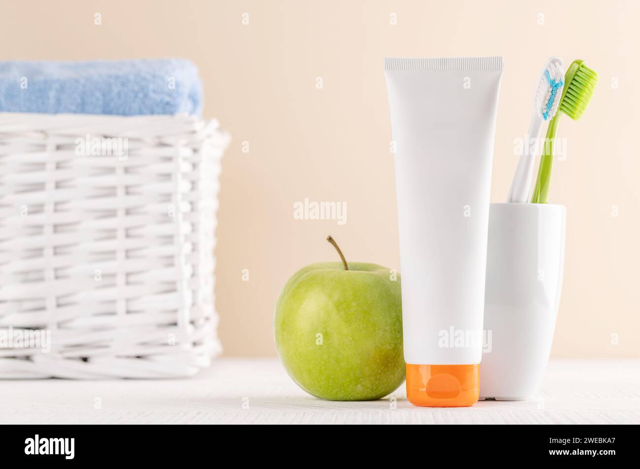 A clean and refreshing image featuring toothpaste and toothbrushes ...