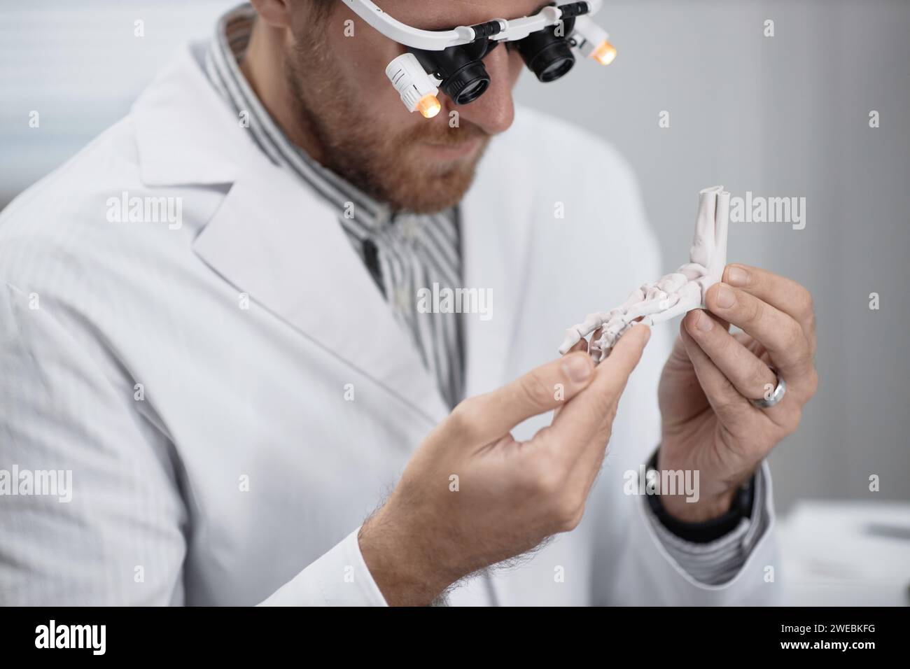 Engineer Looking at 3D Model with Binocular Goggles Stock Photo - Alamy
