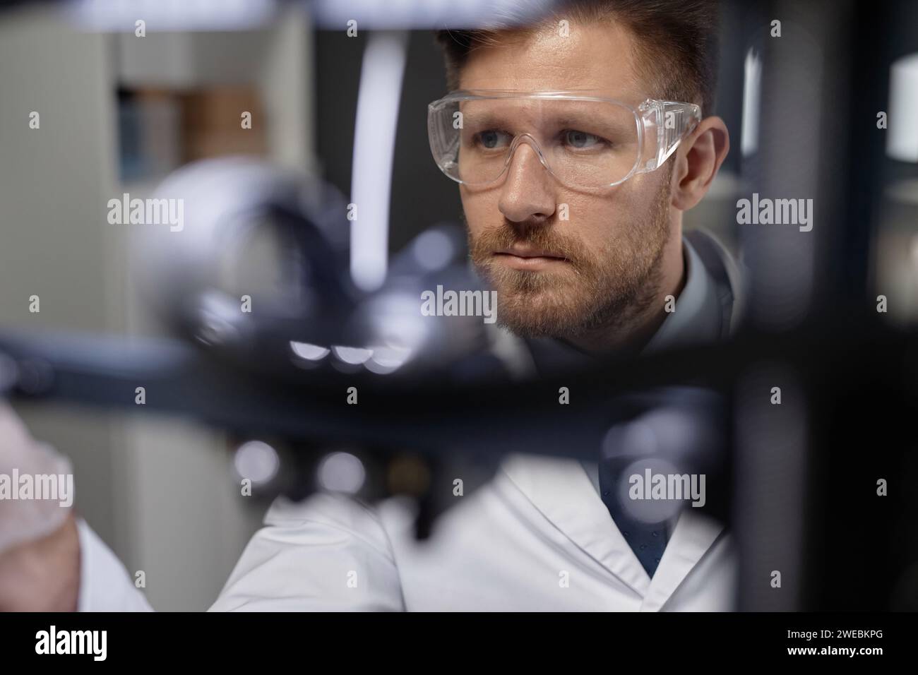 Scientist engineer in safety glasses hi-res stock photography and ...
