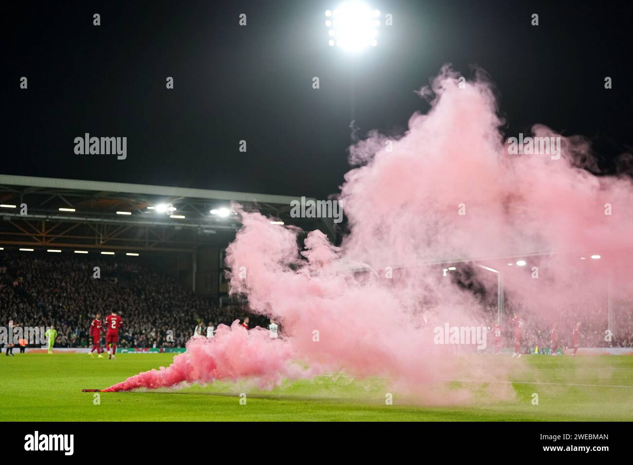 A smoke flare that landed on the pitch during the Carabao Cup semi ...