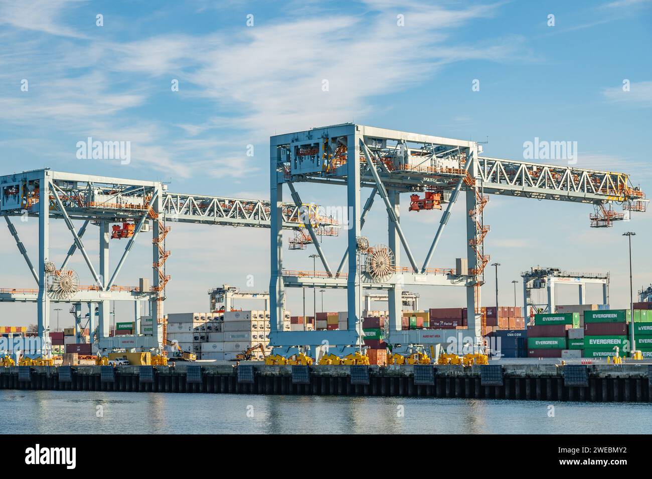 Boston, MA, US-December 8, 2023: Large loading cranes in harbor ready ...