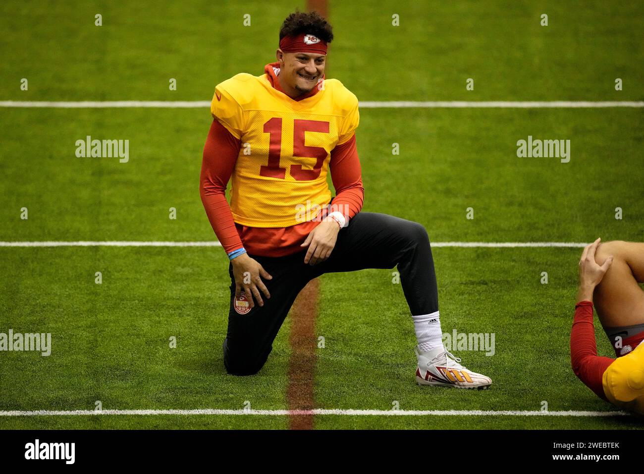 Kansas City Chiefs quarterback Patrick Mahomes stretches during the NFL ...