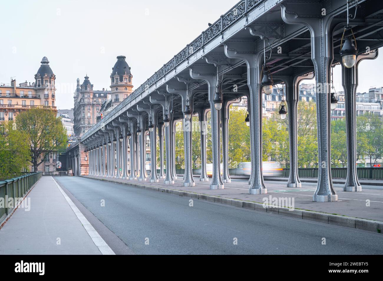 Long row of metal columns of elevated subway. Bir Hakeim Bridge in ...