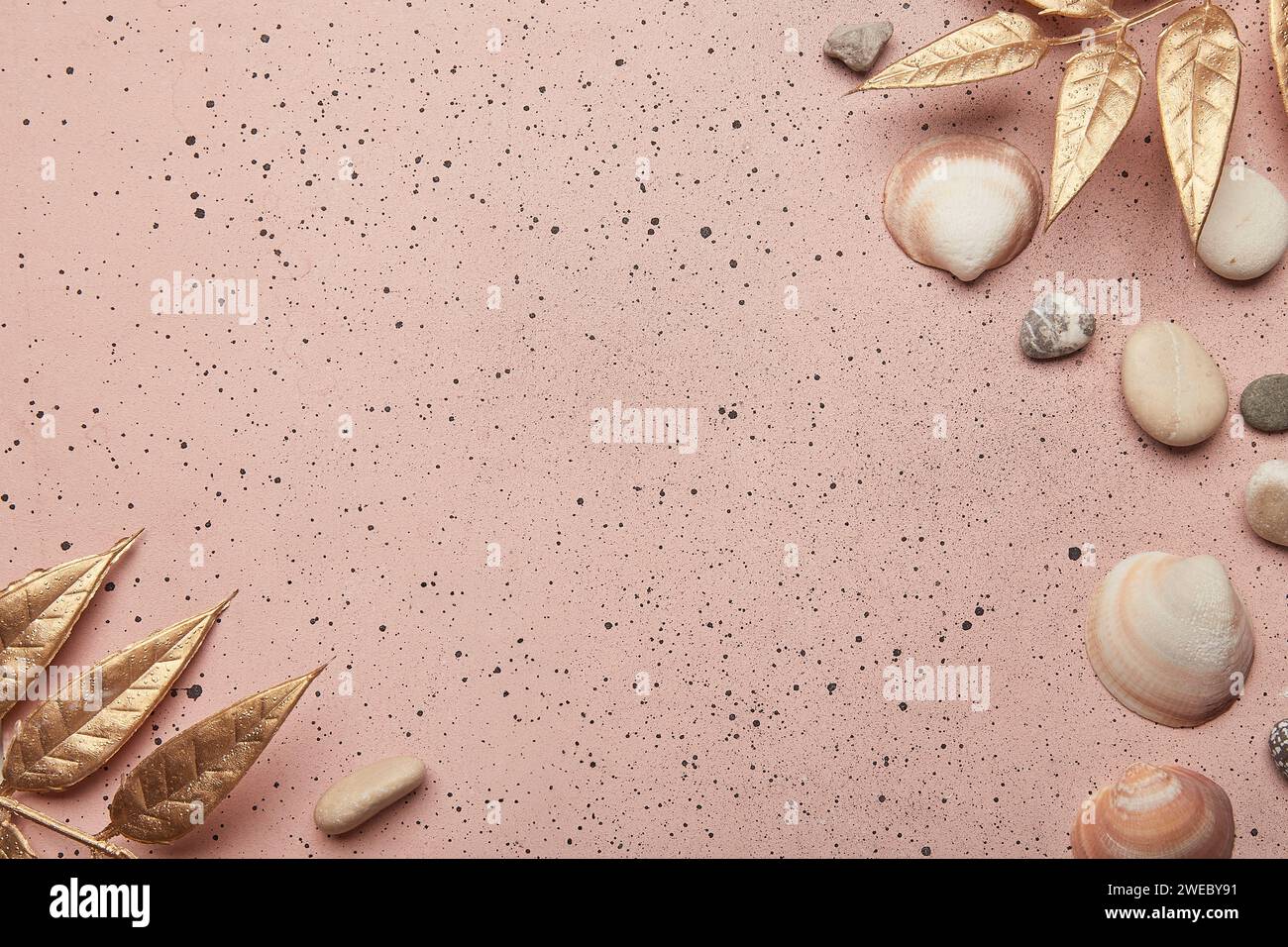 Pink sandy texture with seashells, pebbles for a summer background with ...