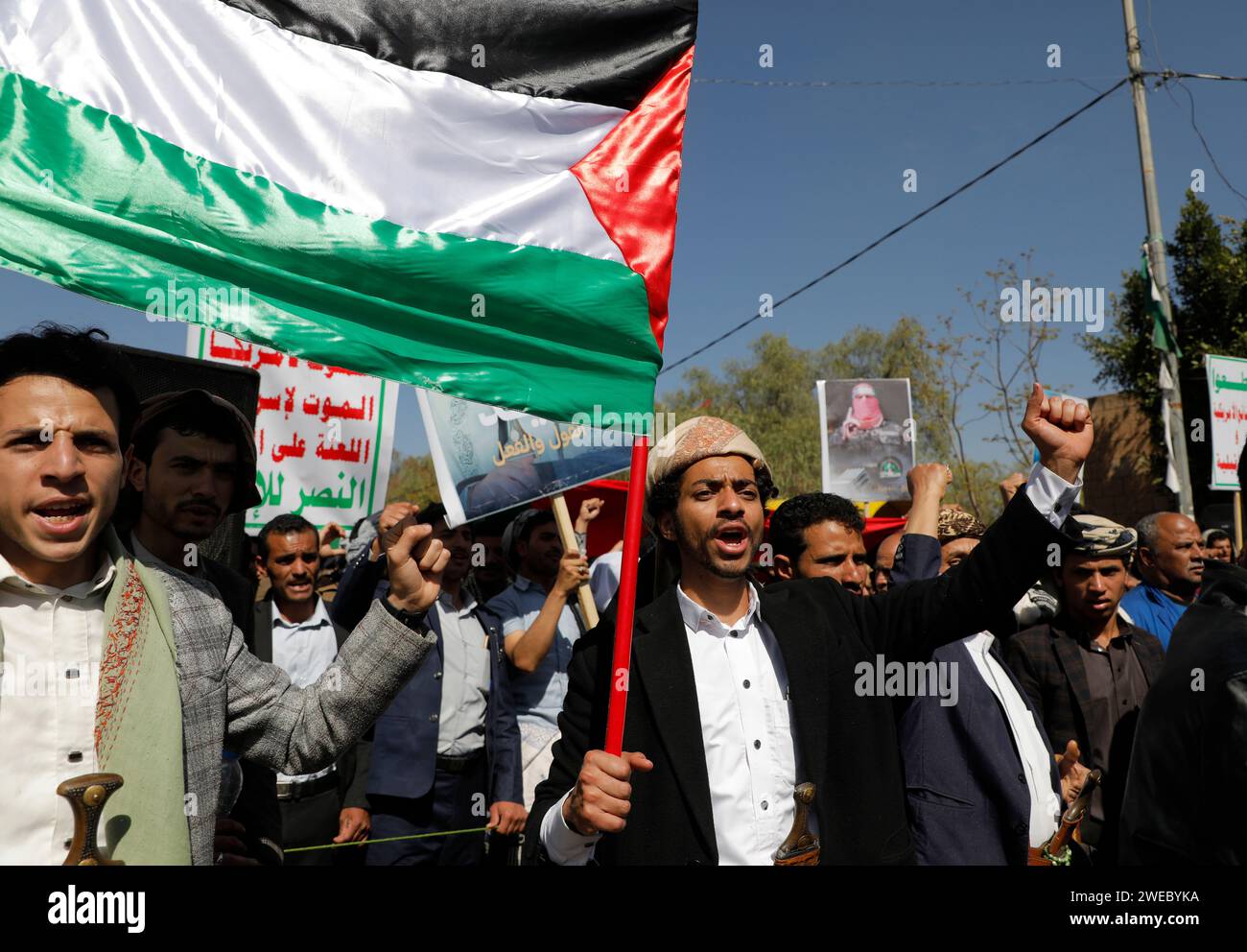 Sanaa, Sanaa, Yemen. 24th Jan, 2024. Protesters hold up Palestinian ...
