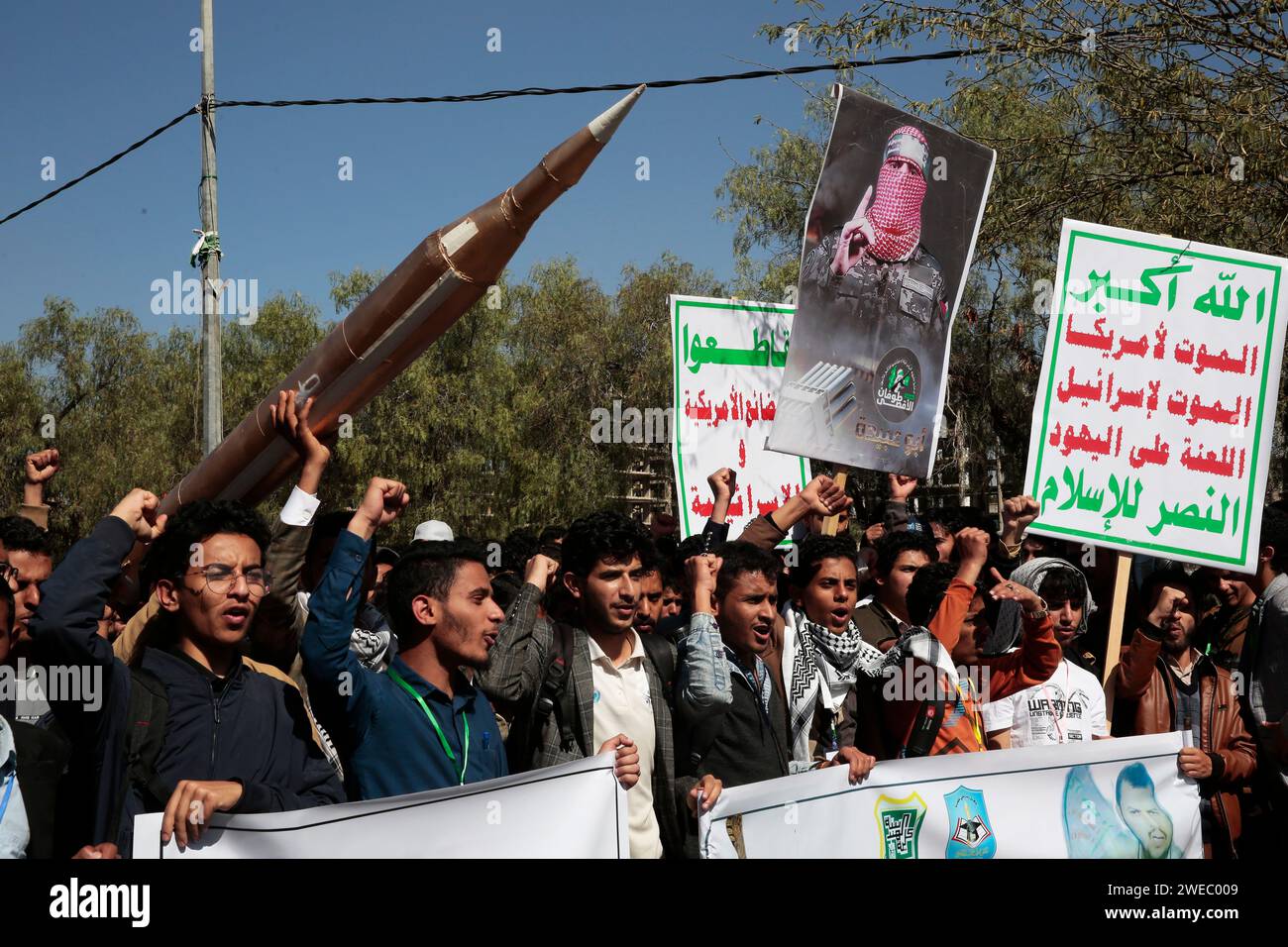 Sanaa, Sanaa, Yemen. 24th Jan, 2024. Protesters hold up a mock missile ...