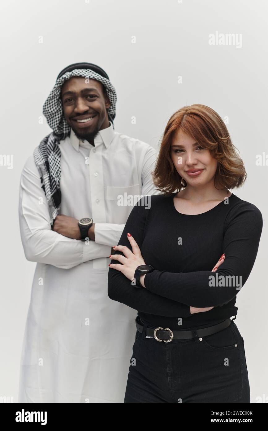 Muslim entrepreneur and a contemporary red-haired girl strike a pose ...